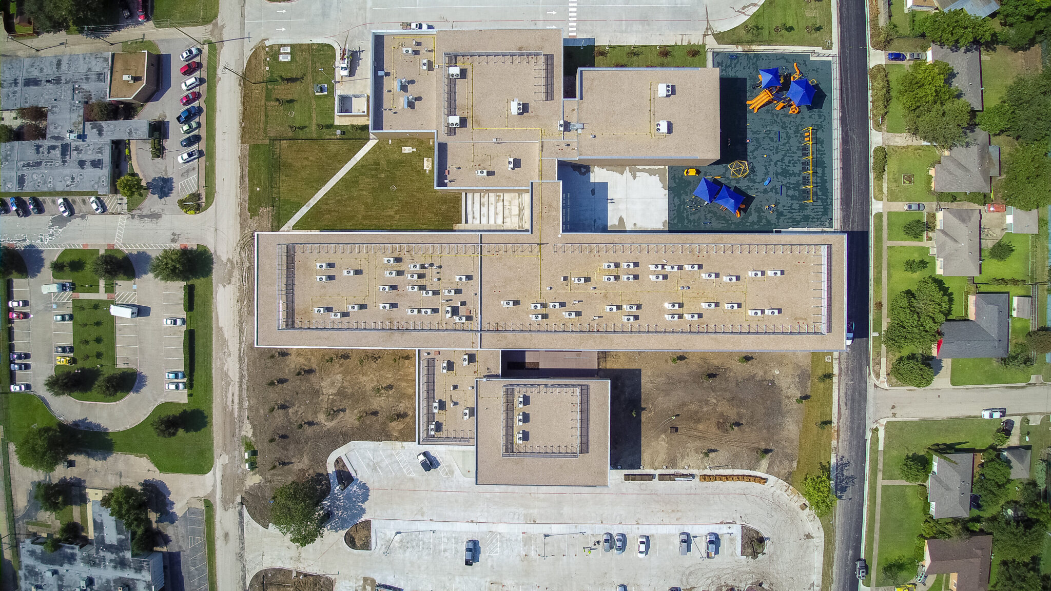 Custom Tailored RoofScreens Give Neighboring Elementary Schools a Look ...